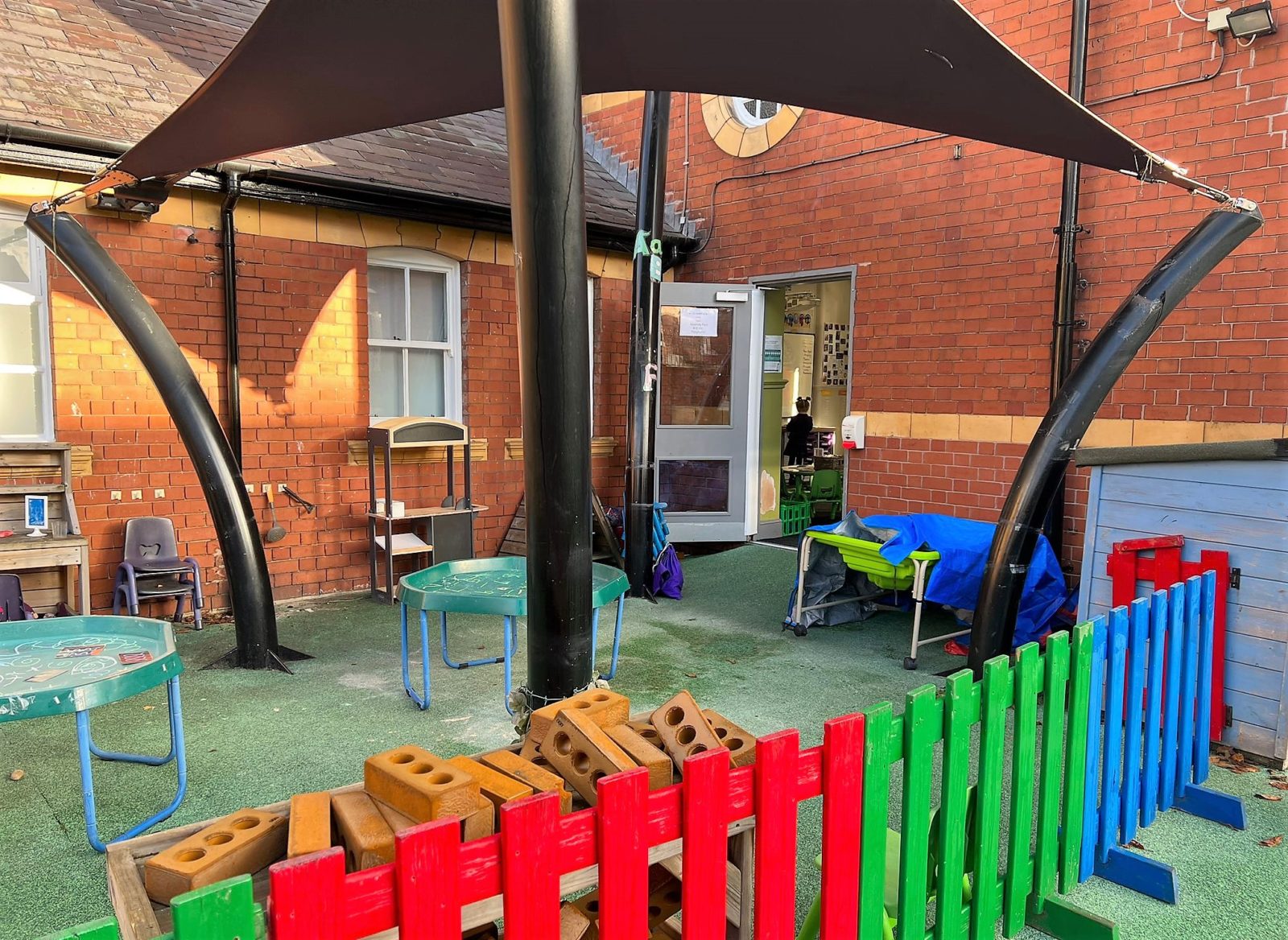 Solicitors lay down the law and pick up tools to help revamp school