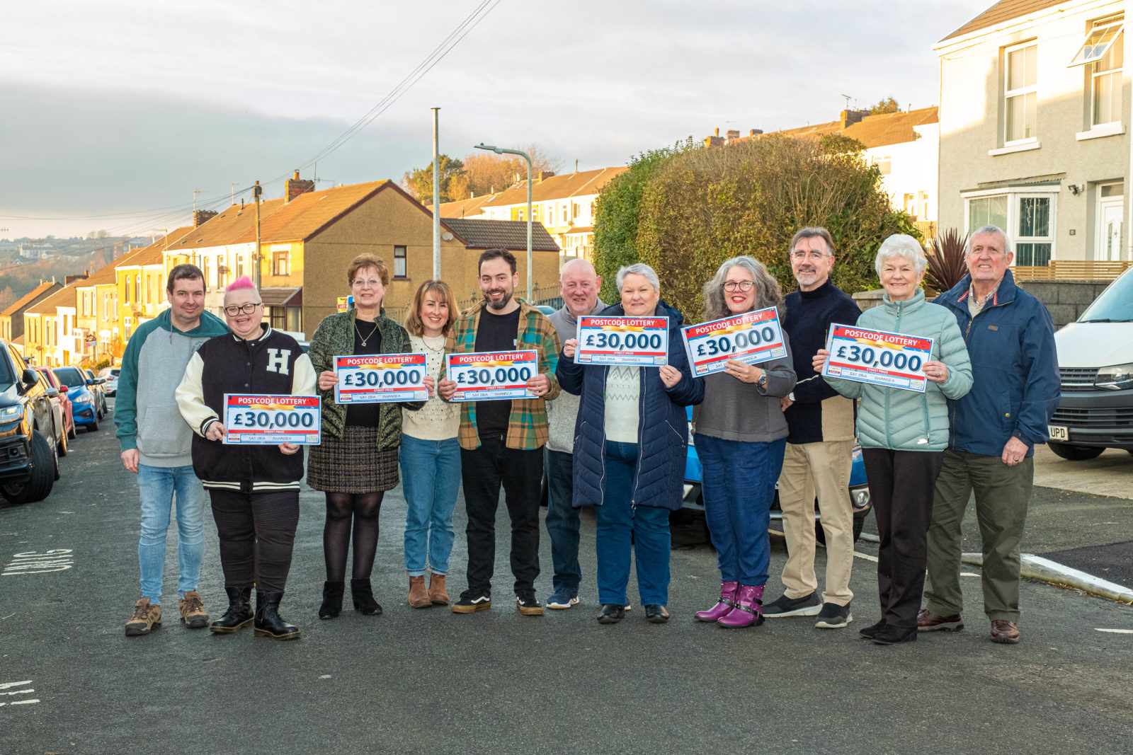 Nine Swansea neighbours share £270,000 lottery win