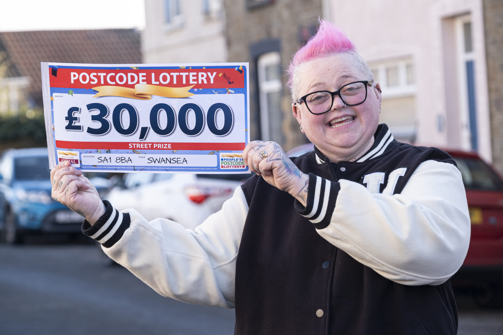 Nine Swansea neighbours share £270,000 lottery win