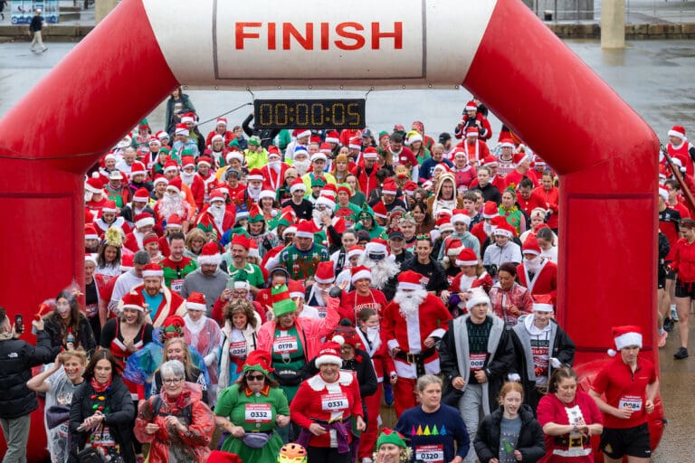 Santa spirit shines at the Calon Hearts Santa Dash 2025 in Cardiff Bay